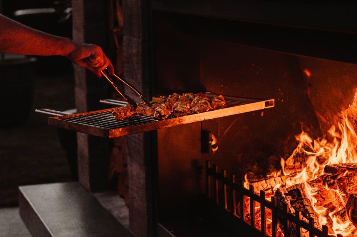 Enhance your outdoor cooking experience with our swinging grill